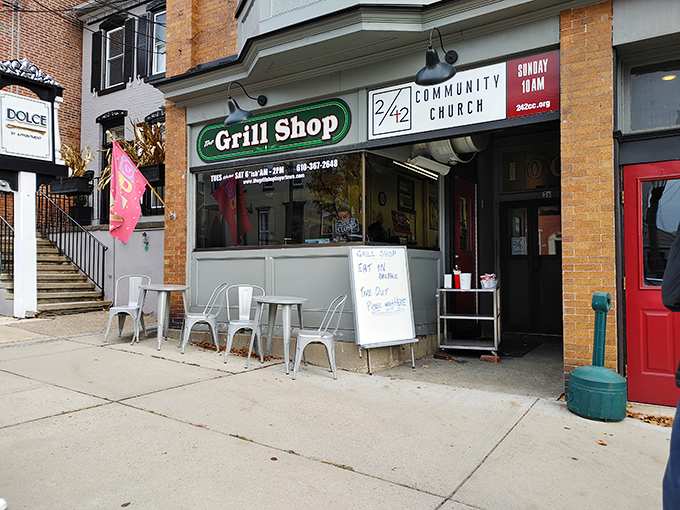 Community gathering spot with sidewalk seating perfect for people-watching. The Grill Shoppe serves up both dogs and local flavor.