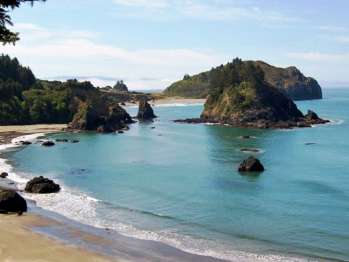 Ojai's downtown glows in the golden hour light, where palm trees and historic architecture create California's most perfect small-town moment.