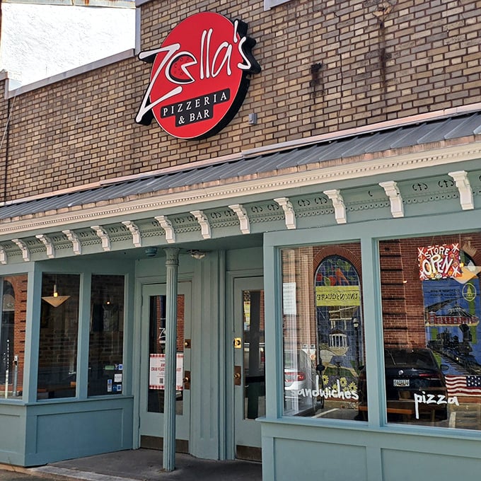 The classic brick-and-green exterior of Zella's hints at the perfect blend of tradition and creativity waiting on your plate. 