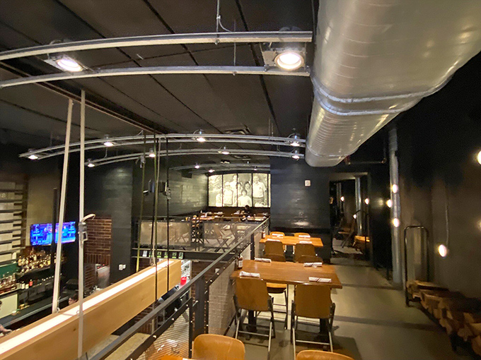 The second-floor seating offers a bird's-eye view of the meat festivities below. Strategic positioning for maximum aroma appreciation.