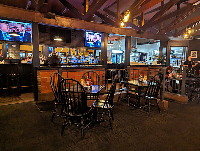 The rustic-meets-refined dining area offers the perfect backdrop for conversations that flow as smoothly as the drinks from the bar.