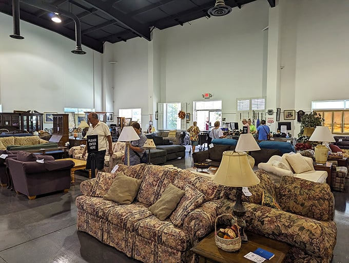 Floral patterns and neutral tones create a living room showroom effect. Shoppers browse with the focus of archaeologists discovering ancient treasures.
