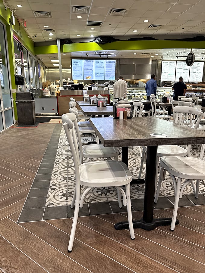 Modern deli vibes with classic flavors. The clean lines and patterned floor tiles create an inviting space where comfort food meets contemporary design.