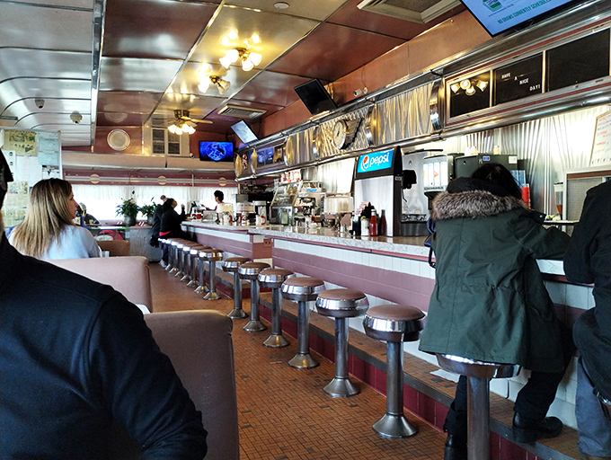 Another glimpse into this breakfast sanctuary where every seat offers front-row access to culinary happiness.