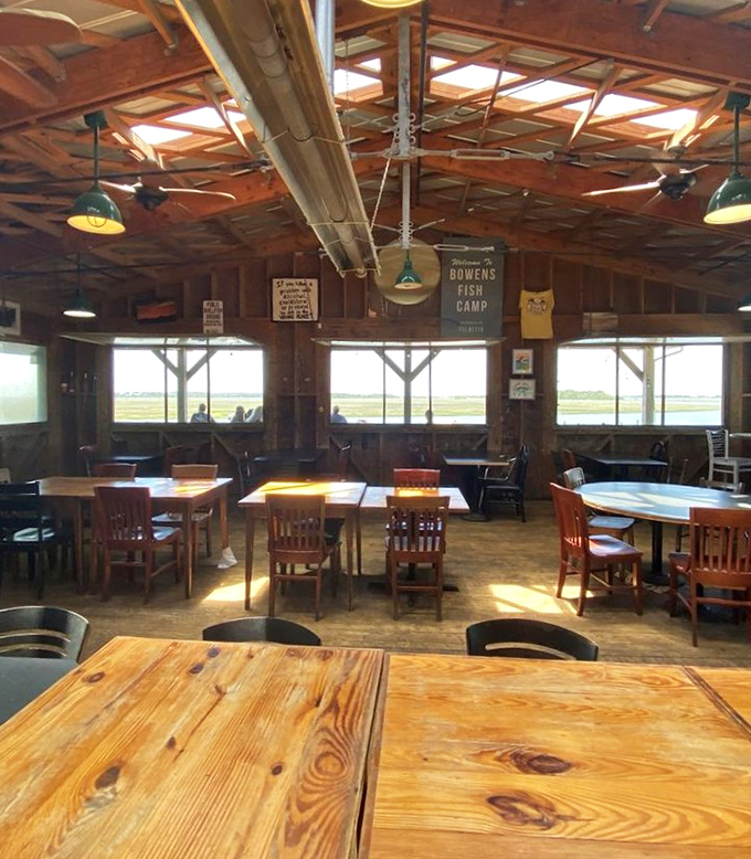 Windows framing marsh views like living paintings, wooden tables that could tell tales of countless seafood feasts and first dates.