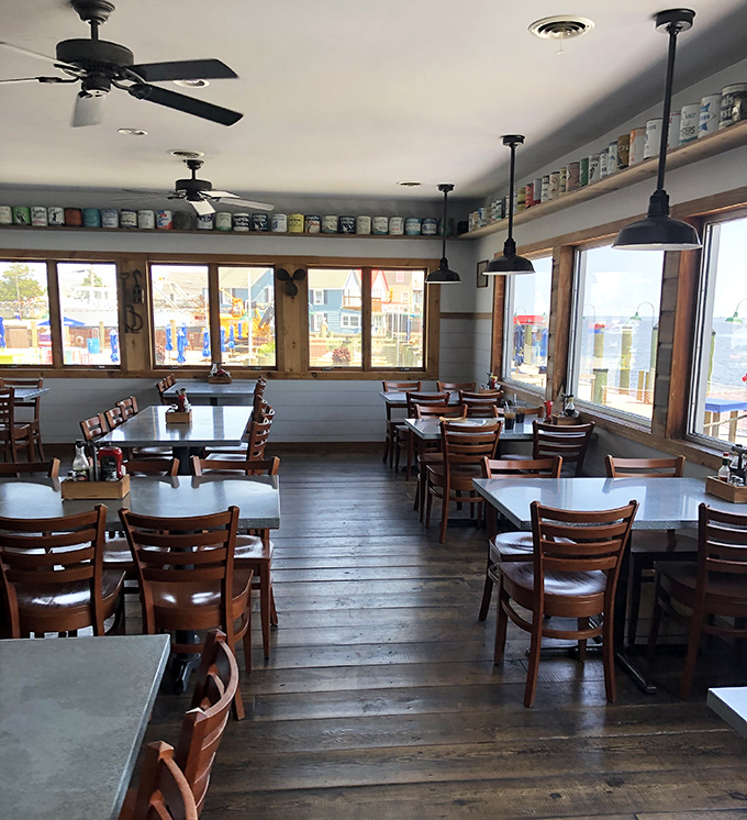 Simple wooden chairs and tables that say, "We put our money into what's on your plate, not what you're sitting on."