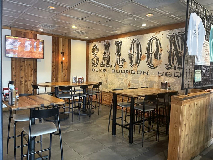 The "Saloon" area offers a more spirited atmosphere where beer, bourbon, and barbecue form the holy trinity of hospitality.