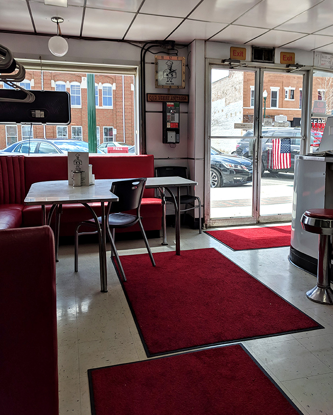 Red booths, red rugs, and a view of small-town America&mdash;this entrance has welcomed burger pilgrims for generations.