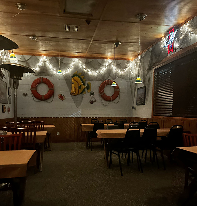 Fishing nets, life preservers, and string lights create that "I've discovered a hidden gem" atmosphere that makes dinner feel like an adventure.