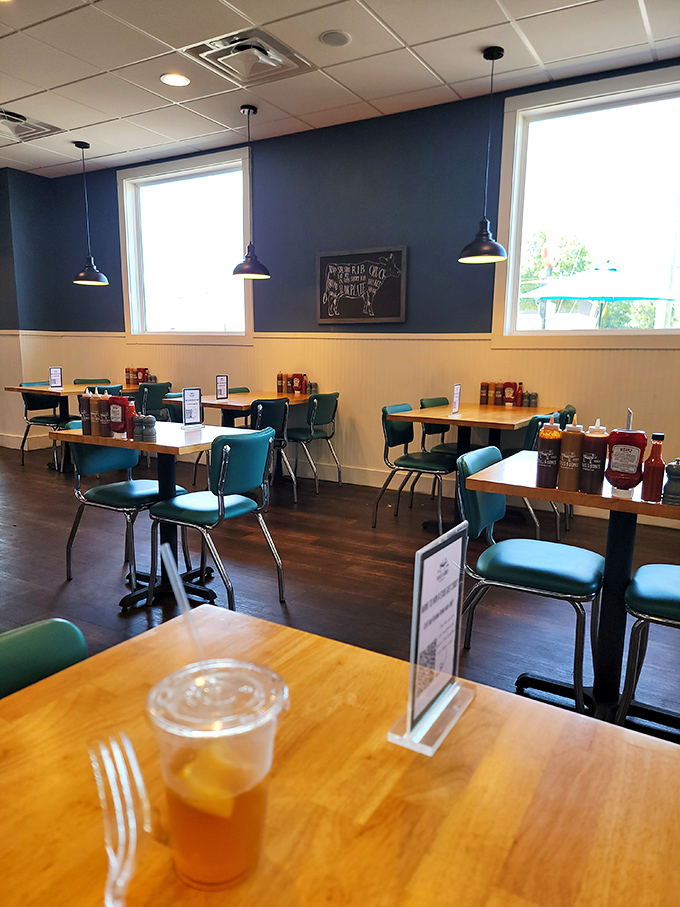 Blue walls, pendant lighting, and sauce bottles standing at attention on every table—the barbecue equivalent of fine dining.