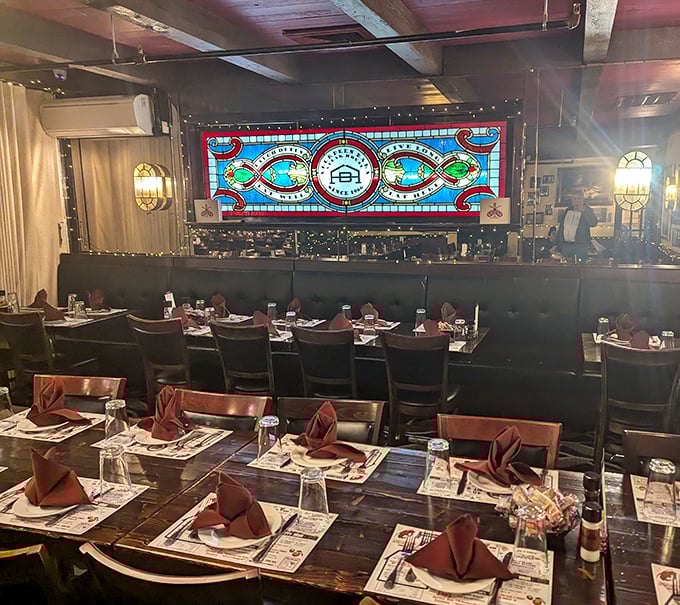 The stained glass adds a touch of church-like reverence to the dining room. After all, good steak is a religious experience.