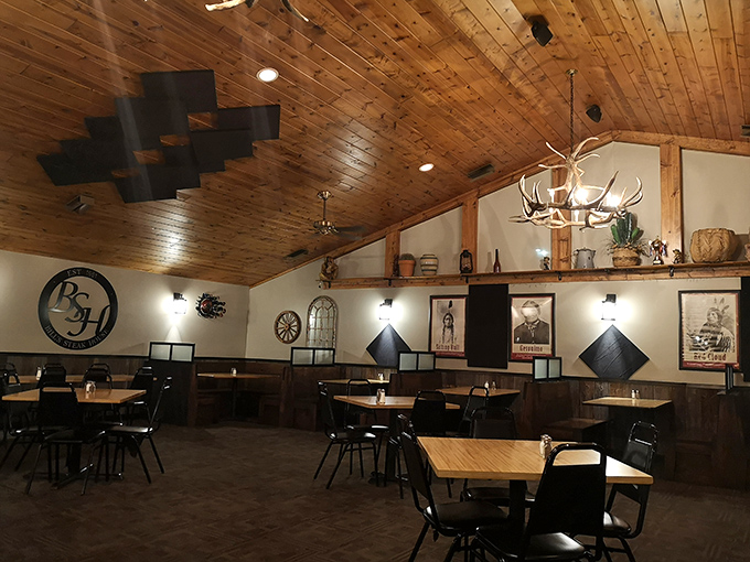 Antler chandeliers, wooden beams, and strategic lighting create the perfect atmosphere for serious meat consumption. Vegetarians, you've been warned.