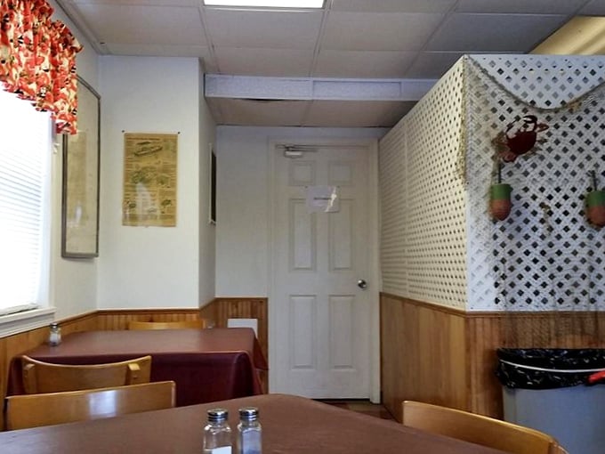 Wood paneling and simple tables say "focus on the food." This isn't Instagram bait&mdash;it's the real deal for people who know what matters.