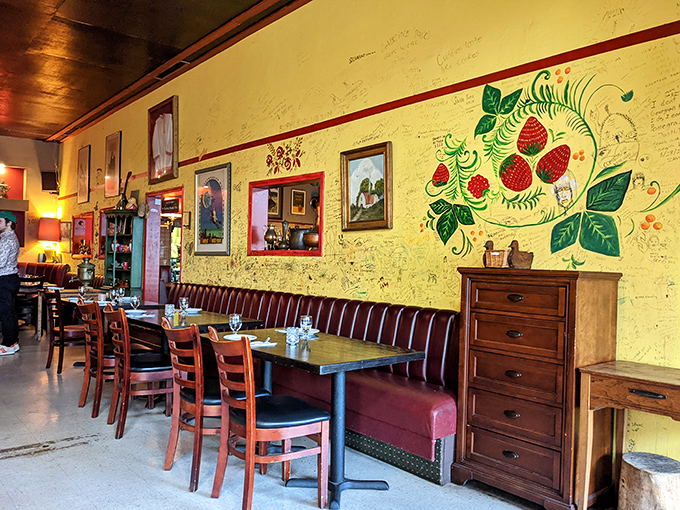 The strawberry mural isn't just decoration – it's a promise of the fresh, vibrant flavors that define Georgian cuisine at Pomegranate.