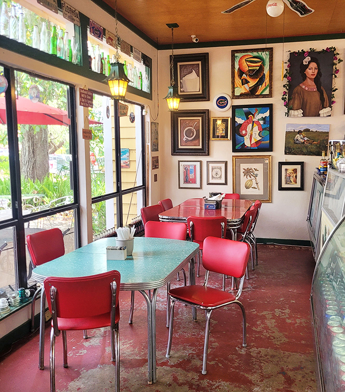 Mix vintage signs with modern comfort, add natural light, and you've got dining room gold.