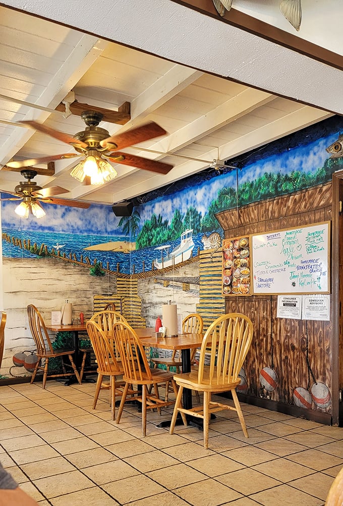 A mural that captures the Keys spirit while wooden chairs invite you to sit and stay awhile. Seafood paradise found.