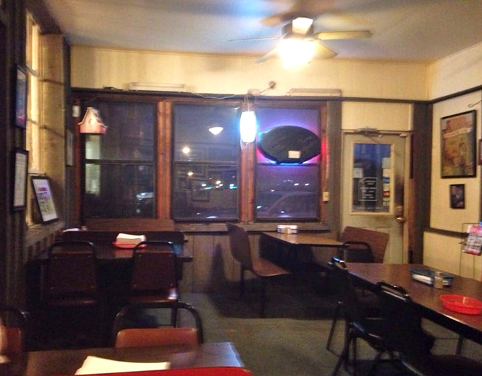 Simple tables, chairs, and wood-paneled walls create the perfect backdrop for the real star of the show—what's on your plate.