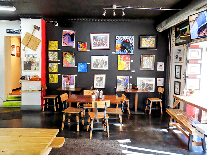 The wall of art adds culture to your cultured proteins. Barbecue joints with personality always deliver more than just what's on the plate.