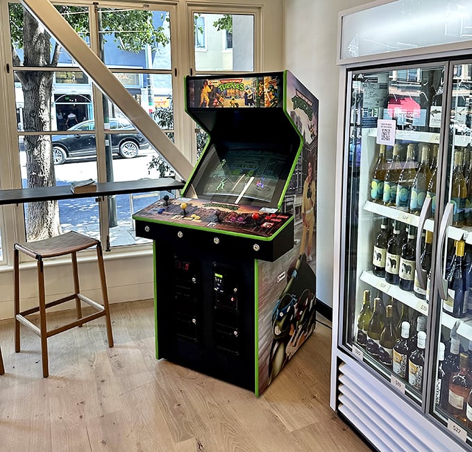 Even the arcade game seems to be saying, "Have some fun while you wait for your pizza!" A playful touch in a seriously good food spot.