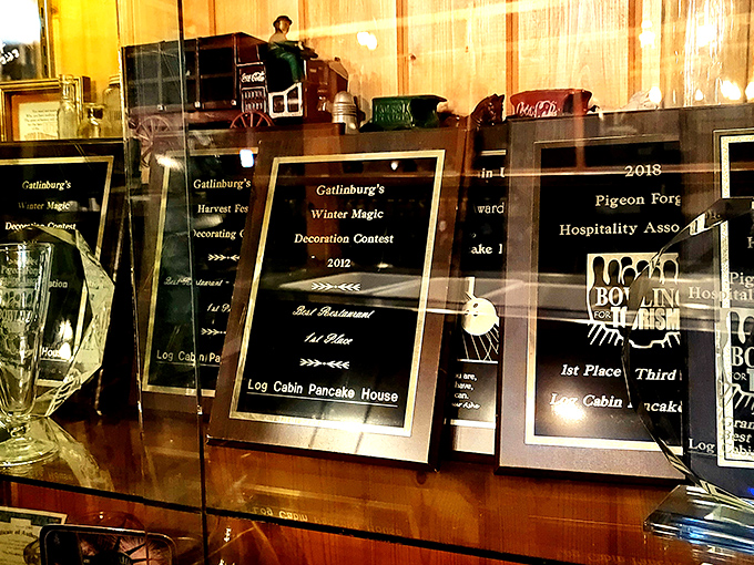 Awards lining the shelves like trophies in a champion's case. When your pancakes win this many accolades, you're doing something right.