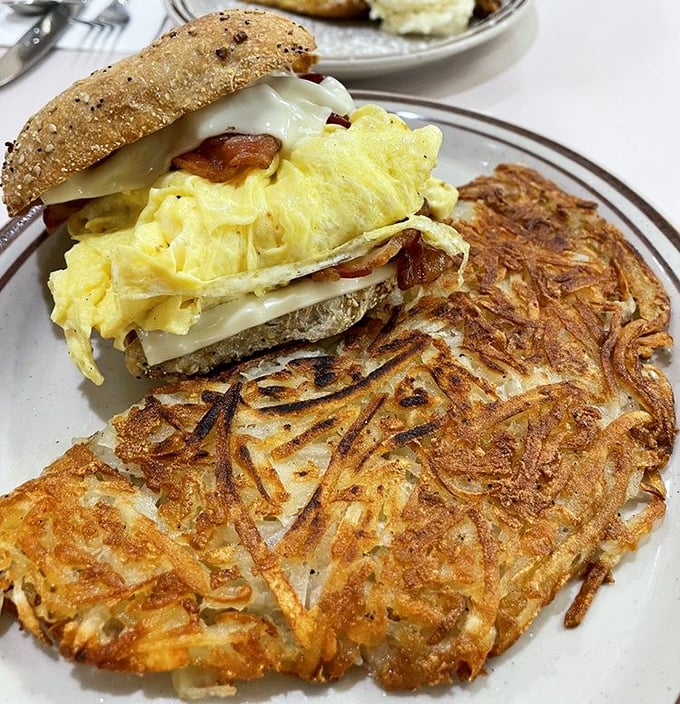 The holy trinity of breakfast sandwiches &ndash; eggs, cheese, and bacon &ndash; with a hashbrown sidekick that deserves its own fan club.