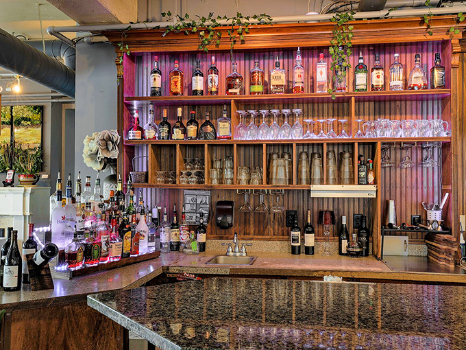 The bar shelves tell stories of celebrations past and future. Those bottles stand at attention, ready for your next toast.