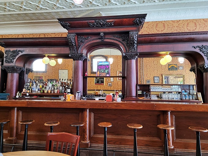 The bar at Kissner's isn't just serving drinks&mdash;it's serving history with its ornate woodwork and century-old craftsmanship that simply doesn't exist anymore.