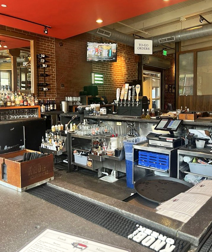 The bar stands ready to quench thirsts awakened by smoky flavors. Craft beers and cocktails await to complete your barbecue pilgrimage.