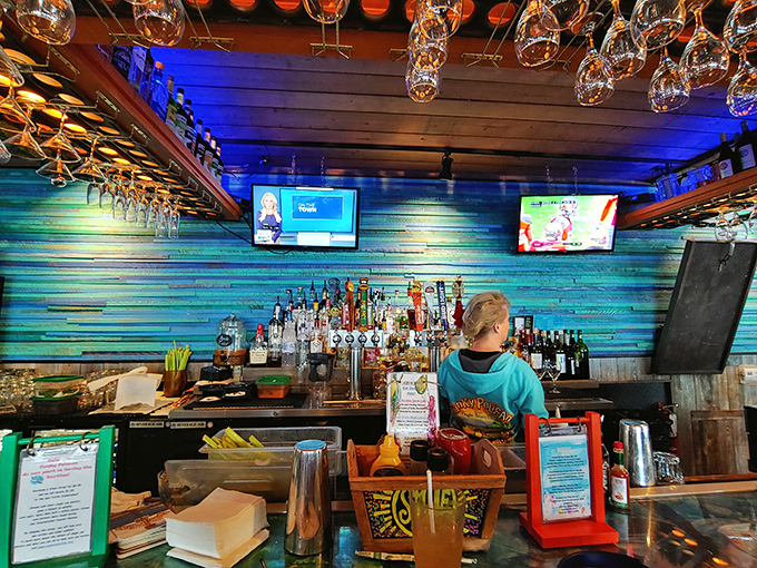 The bar stands ready to pour liquid courage for anyone brave enough to tackle the entire menu.