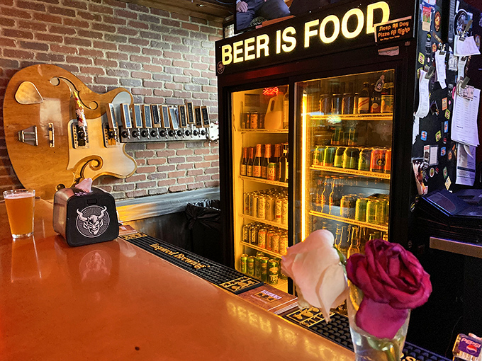 "Beer is Food" isn't just a sign—it's a philosophy at South Park. The guitar-shaped tap handle reminds us that good drinks, like good music, bring people together.