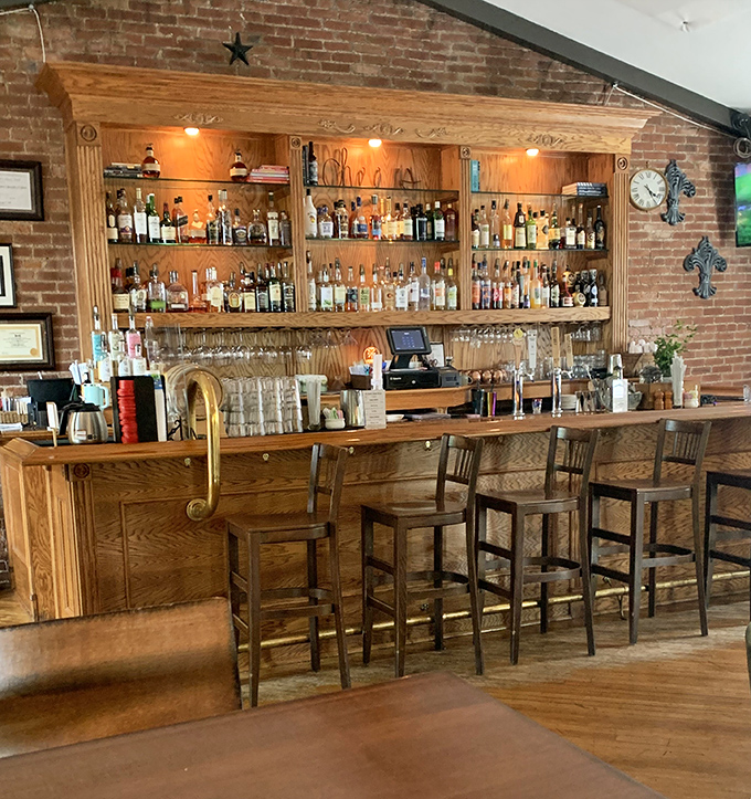 Not just a bar, but a liquid library with wooden shelves holding spirits for every mood and occasion&mdash;from celebration to contemplation.