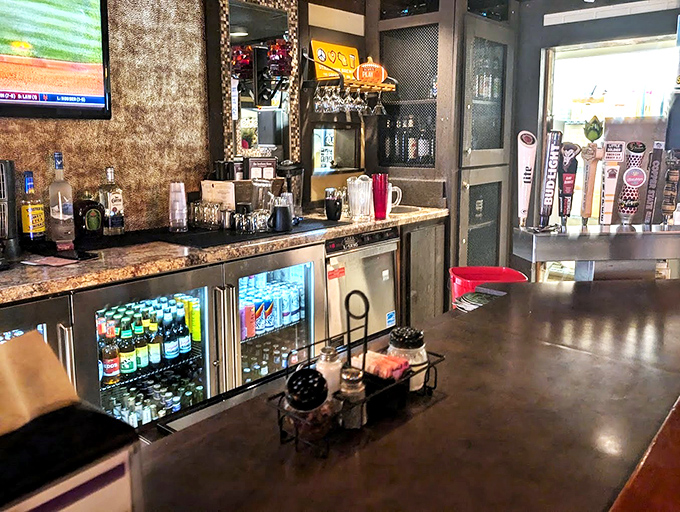 The bar setup isn't trying to be trendy or Instagram-worthy &ndash; it's focused on the timeless art of serving cold drinks alongside hot pizza.