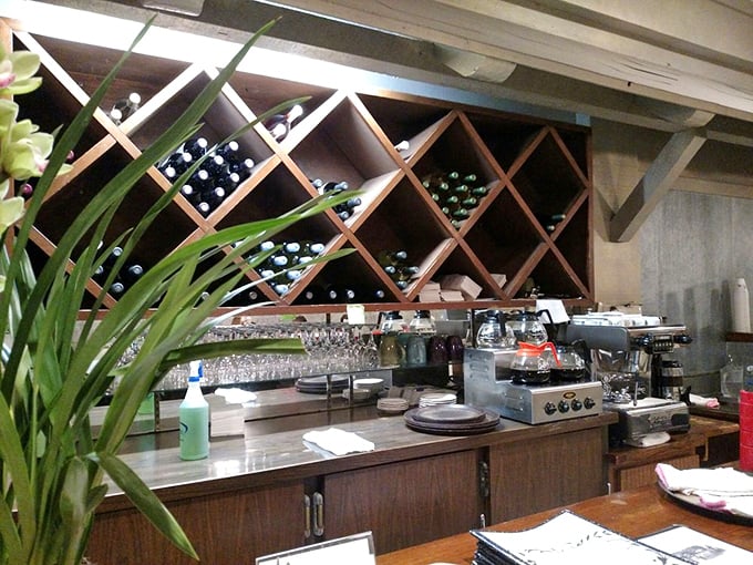 The bar area with its diagonal wine rack feels like discovering a secret speakeasy hiding within your favorite diner. Best of both worlds.