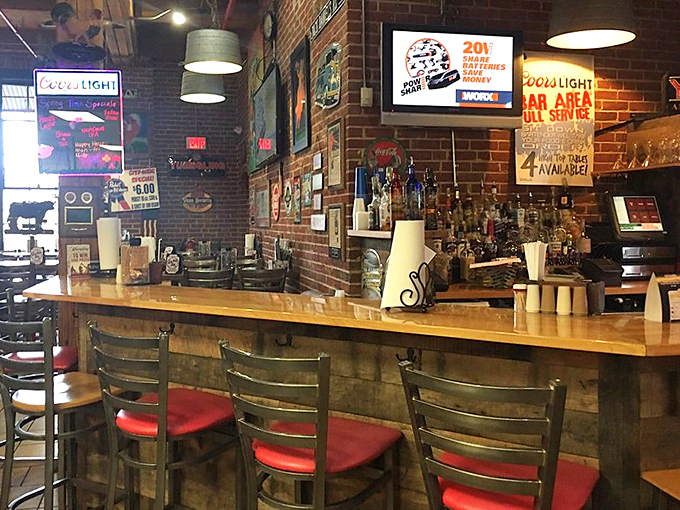 Not just a bar, but a shrine to the perfect barbecue accompaniments. Those red bar stools have witnessed countless sauce-induced revelations.