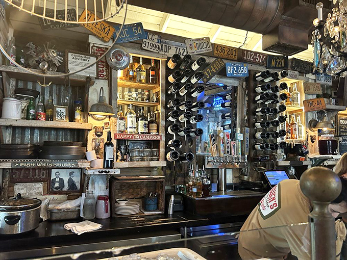 Where vintage meets maritime in a bar that feels like it was assembled from the best garage sales in the South.