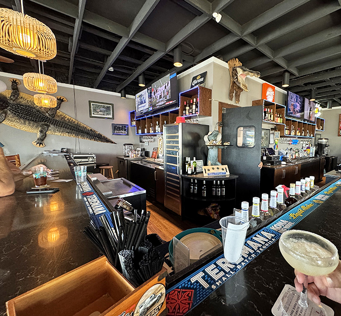 Mounted gators watch over the bar like scaly guardians. This isn't interior decoration; it's a Florida history museum where you can order a margarita.