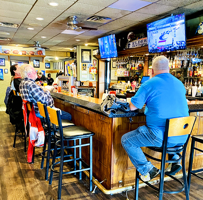 The Golden Fleece Lounge: where Cincinnati sports are religion, regulars are royalty, and your drink arrives before you've fully settled onto your barstool.