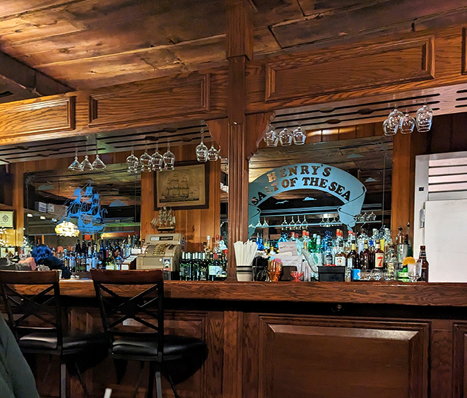 The bar area doesn't just serve drinks&mdash;it serves stories. Wood, brass, and nautical touches create the perfect backdrop for seafood tales.