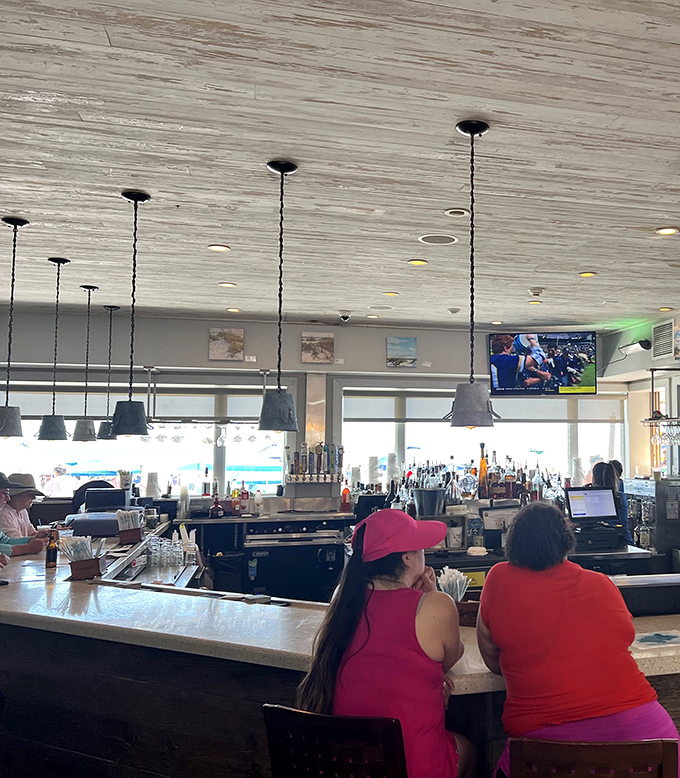 The bar where "I'll just have one" becomes "let's see the dessert menu." Vacation time operates differently here.