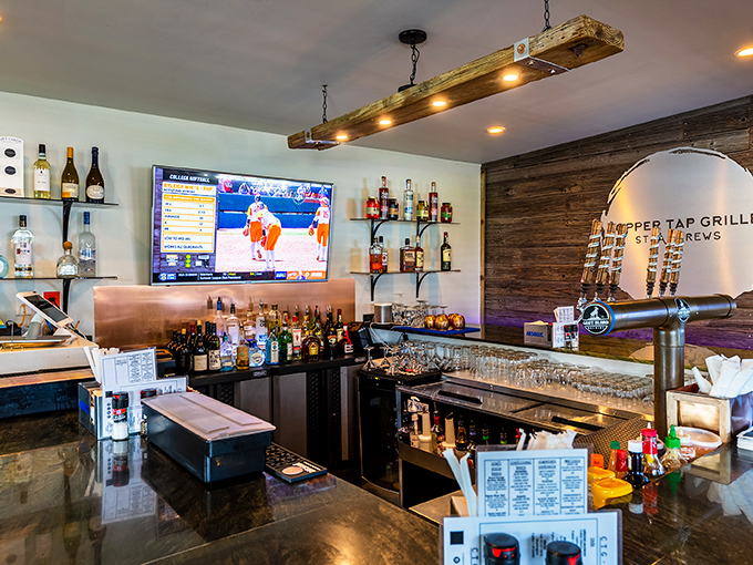 The bar area strikes that perfect balance&mdash;enough bottles to promise adventure, enough taps to ensure happiness, and TVs strategically placed for sports emergencies.