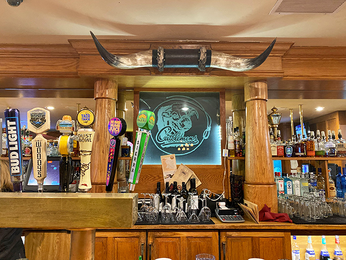 Longhorns mounted above the bar remind you that in this temple of beef, you're drinking with the blessing of bovine royalty.