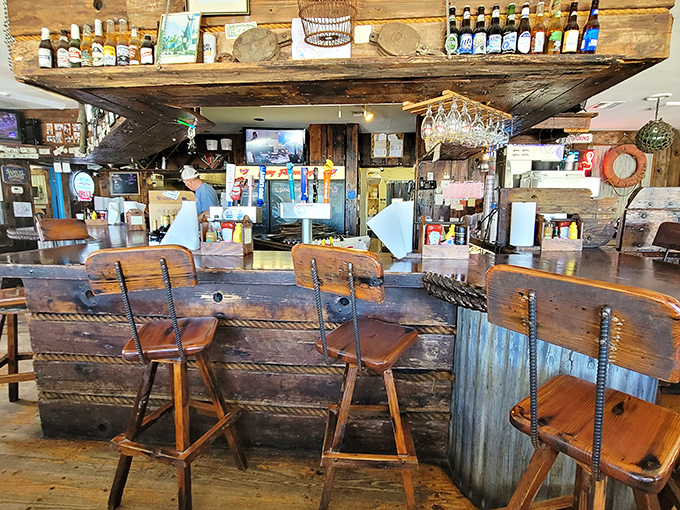 The bar isn't just where drinks are served; it's command central for the entire Lazy Flamingo experience. Nautical meets practical.