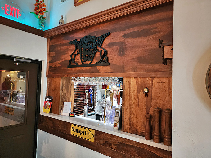 Behind this wooden counter, German beer flows and schnitzel dreams come true. It's basically the Autobahn to satisfaction.