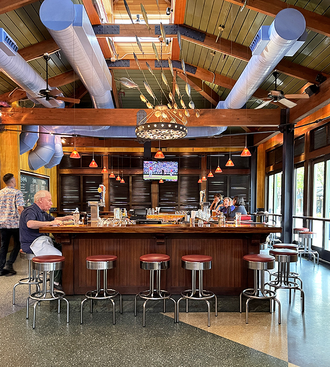 The bar isn't just a place to wait for your table&mdash;it's command central for cocktail magic and spontaneous friendship formation.