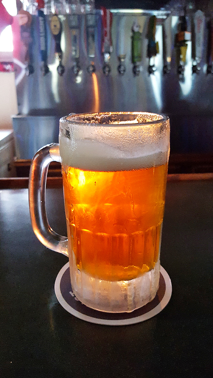 A frosty mug of liquid gold that catches the light just right. This beer isn't just cold&mdash;it's the perfect companion to everything on the menu.