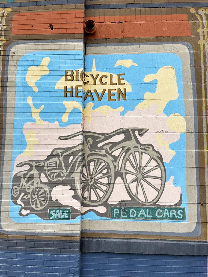 Murals outside announce your arrival at two-wheeled paradise. The artwork captures the freedom and joy bicycles represent.