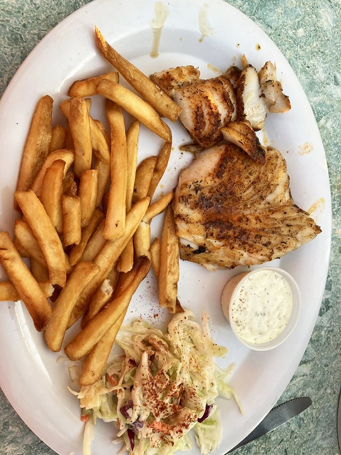 Blackened grouper that doesn't need fancy plating&mdash;just perfectly seasoned fish, honest sides, and a reminder that simple food done right is culinary magic.