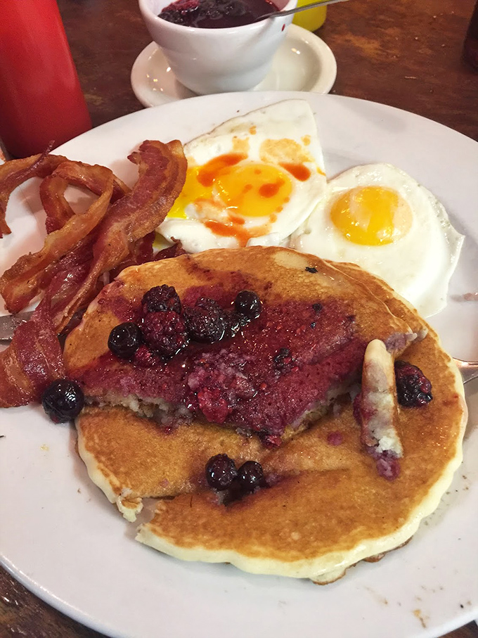 Blueberry pancakes so fluffy, they could double as breakfast clouds if clouds were edible.