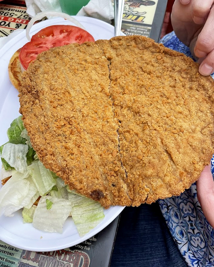 Breaded veal that's bigger than the plate it sits on. Midwestern portion sizes that say "You won't need dinner... or breakfast tomorrow."