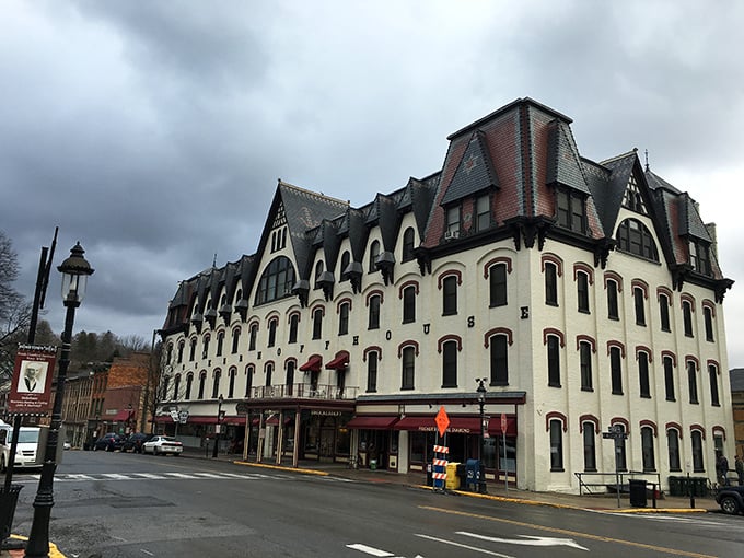 The Brockerhoff's distinctive silhouette dominates the corner like an architectural exclamation point, its Victorian details preserved across generations.